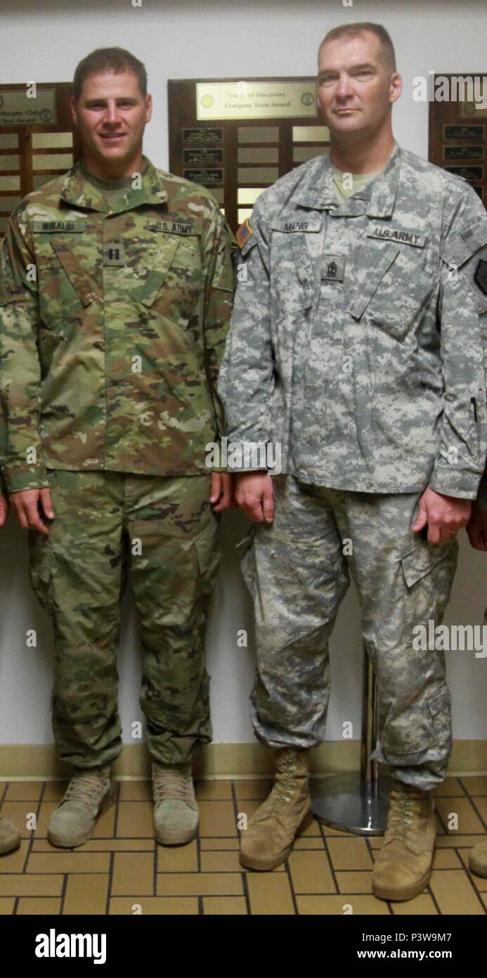 Capt. Andrew Miraldi and 1st Sgt. Aaron Mang, assigned to the 571st ...