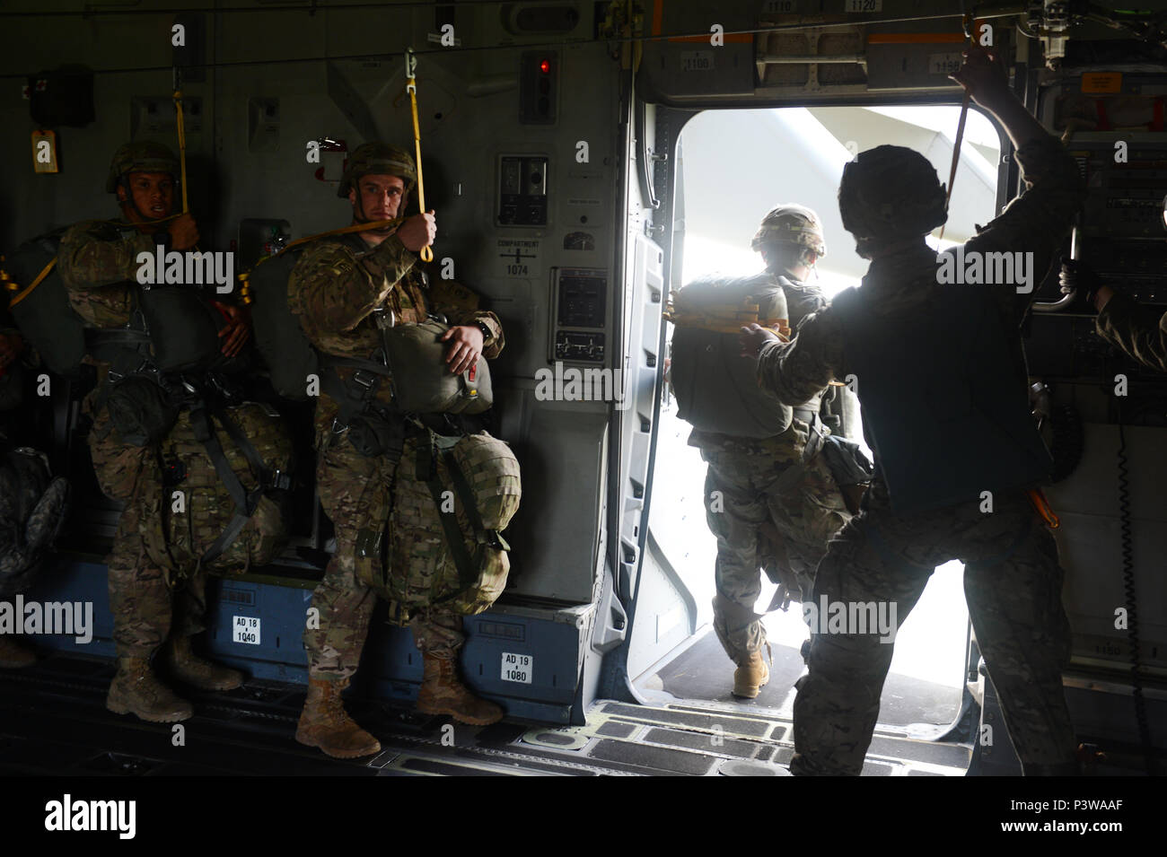 U.S. Army members from the 82nd Airborne Division prepares to jump on ...
