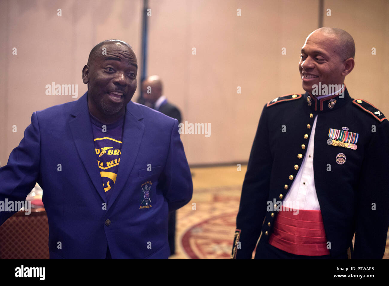 Col. Reginald L. Hairston talks with fraternity members during the ...