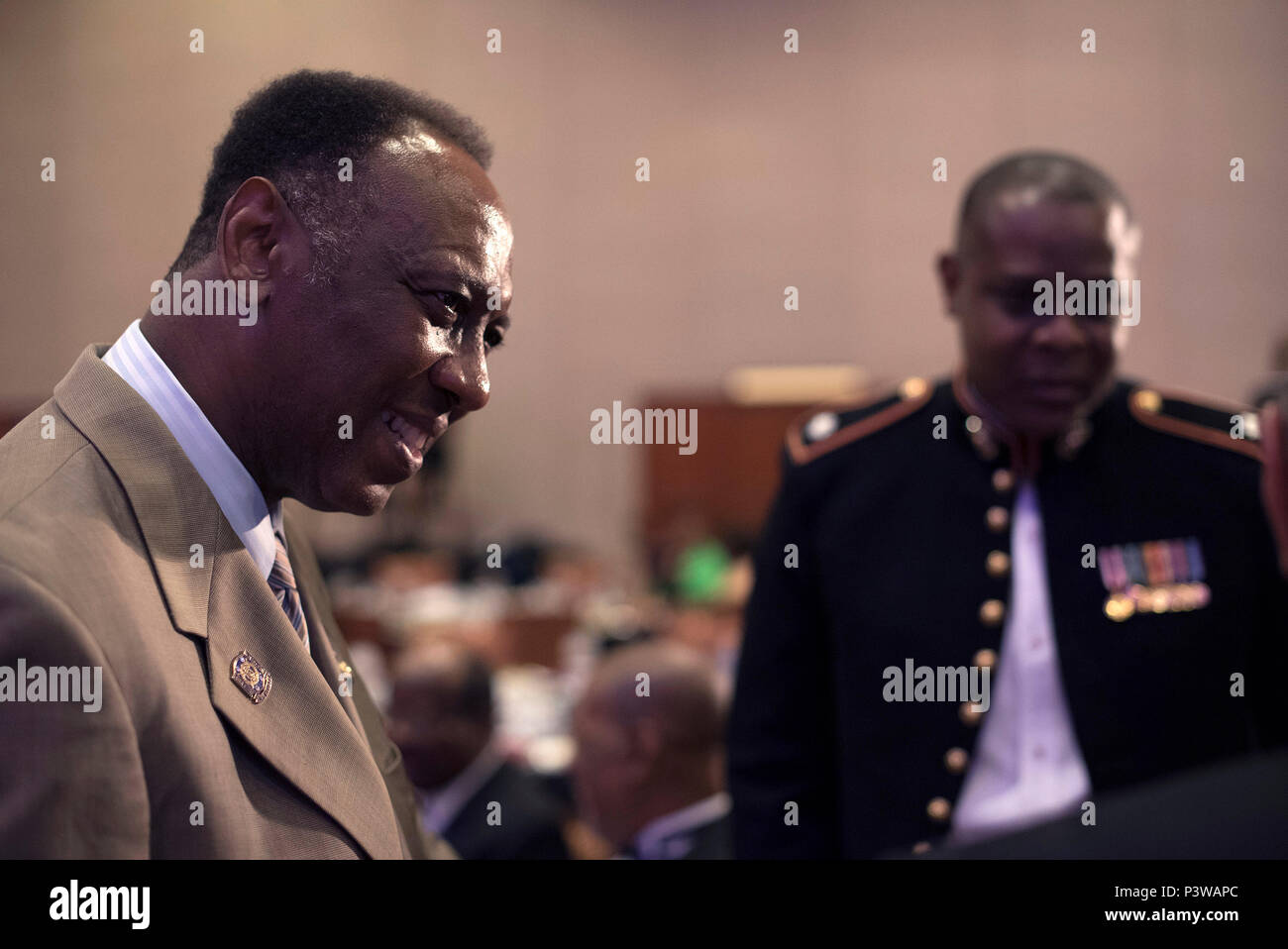 Col. Reginald L. Hairston talks with fraternity members during the ...