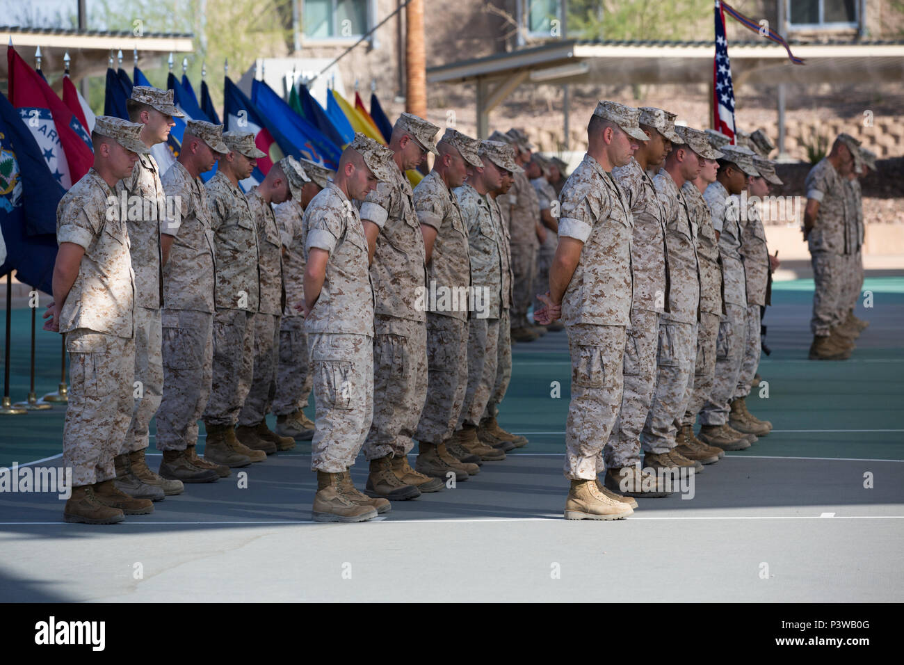 Marines with the Marine Corps Tactics and Operations Group bow their ...