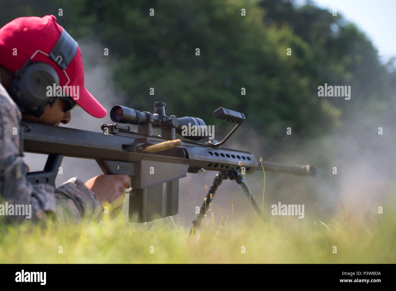 An 11th Security Support Squadron instructor fires a Barrett M107 .50 ...