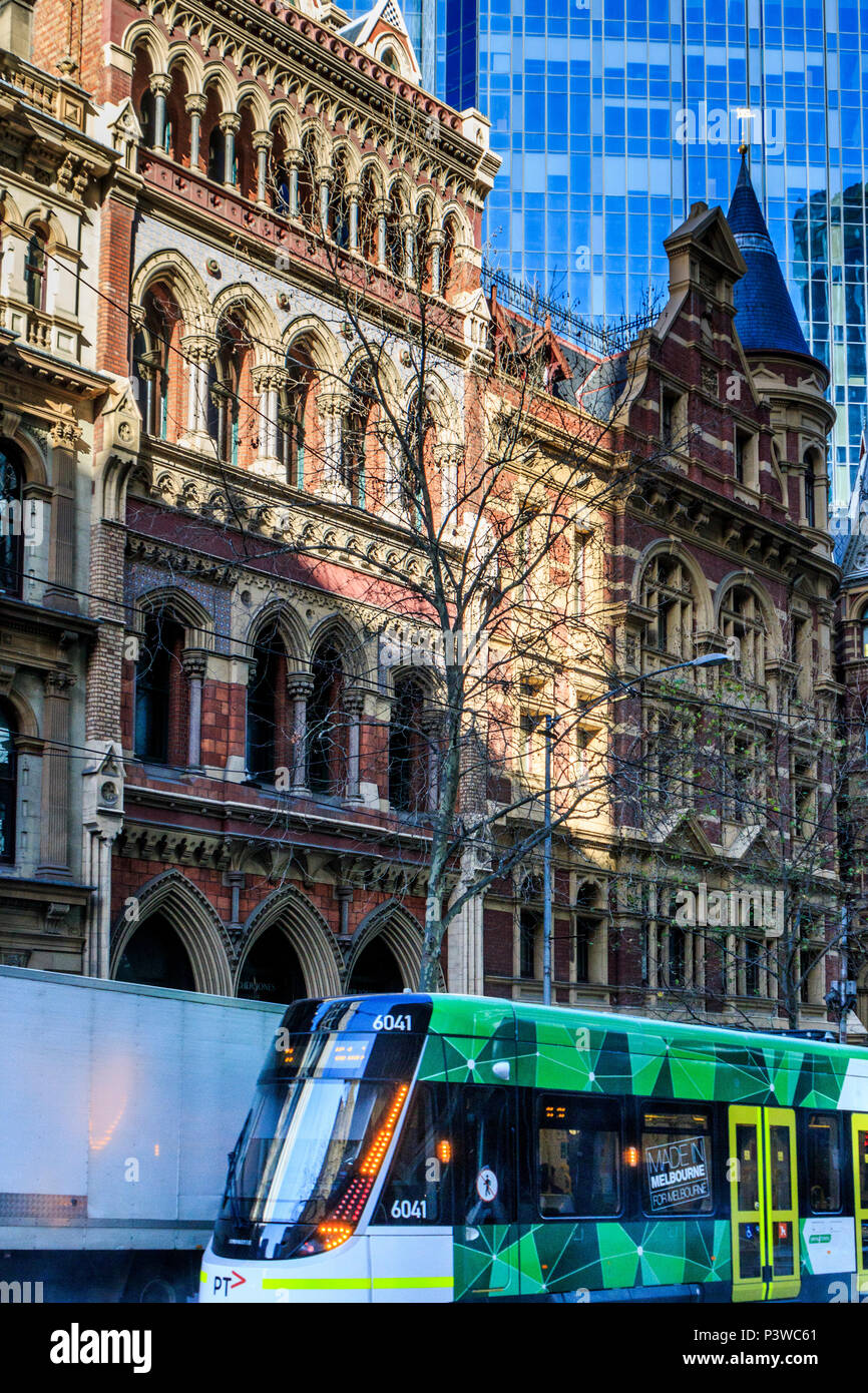 Australia, Melbourne, Victoria, Victorian era buildings, green tram ...