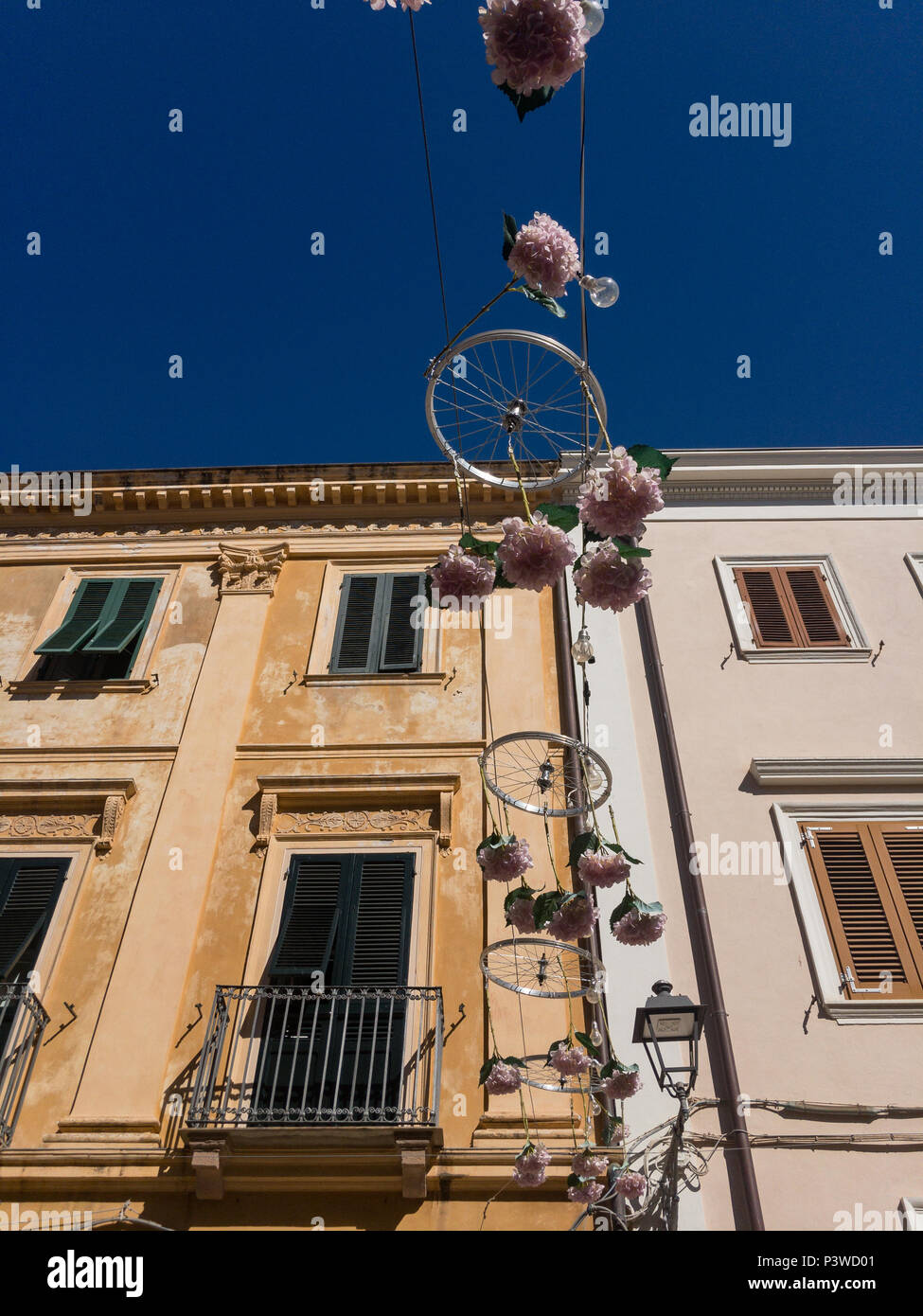 Flower Decorations in the streets of the old town of Alghero on the ...