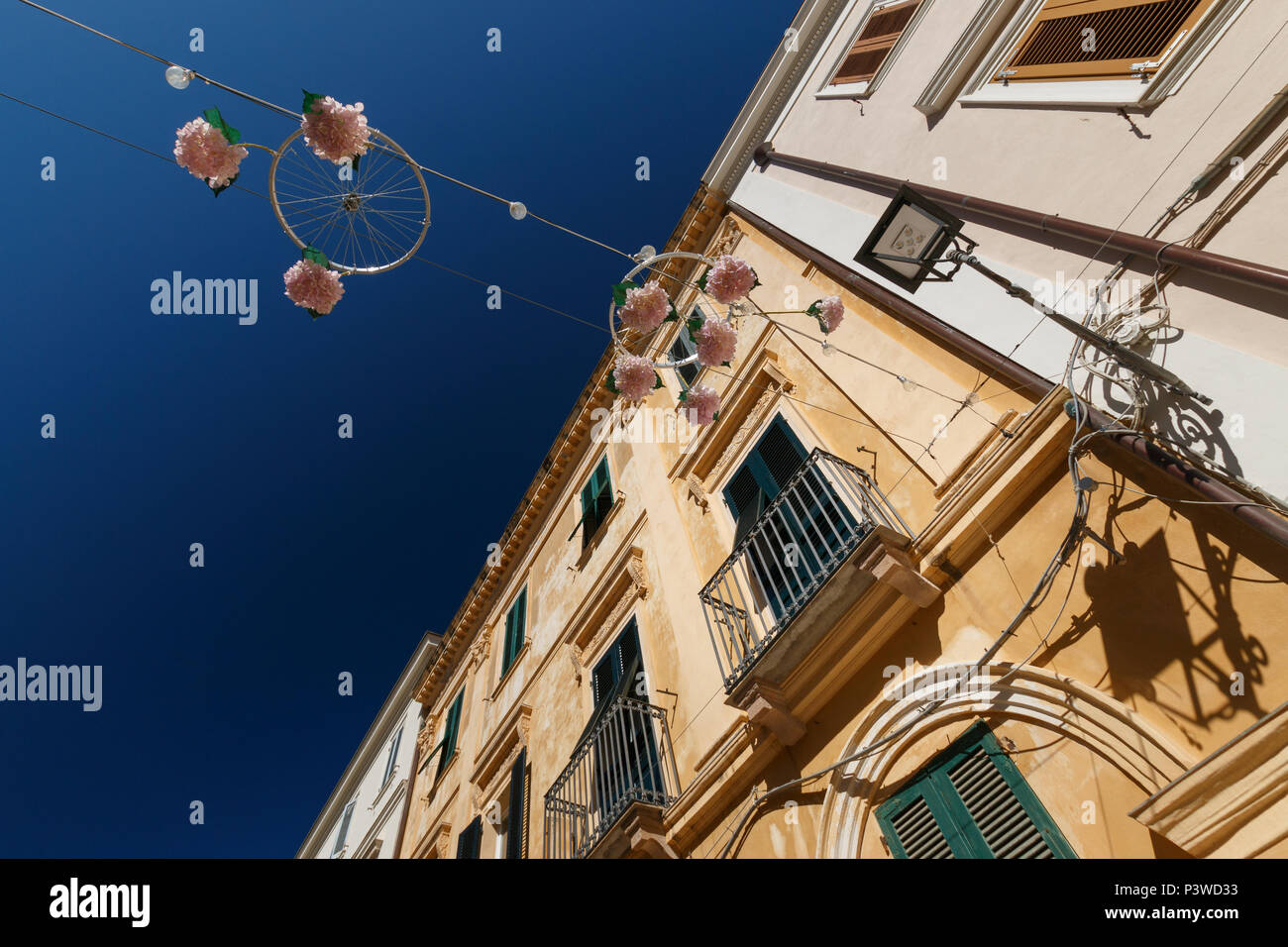 Flower Decorations in the streets of the old town of Alghero on the ...
