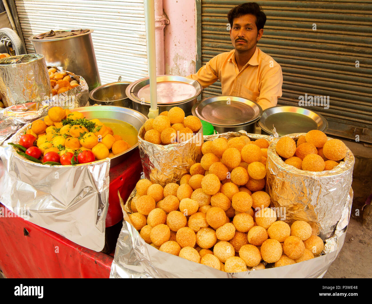 Indian man eating hi-res stock photography and images - Alamy