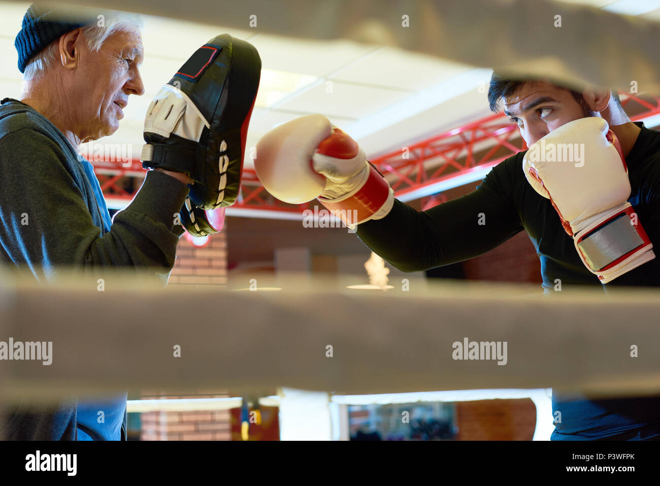 Young elderly men training hi-res stock photography and images - Alamy