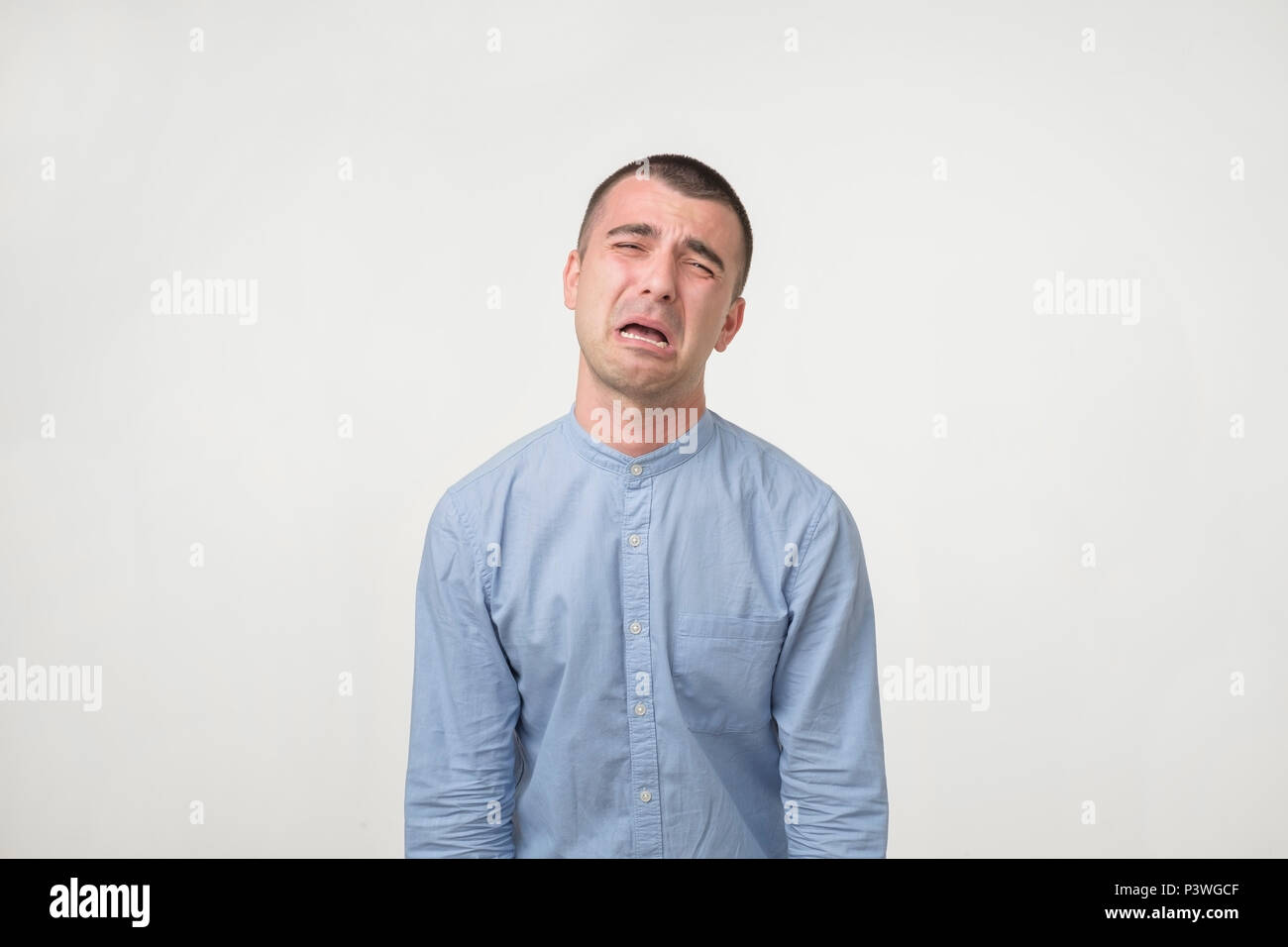 Sad man complaining alone hi-res stock photography and images - Alamy