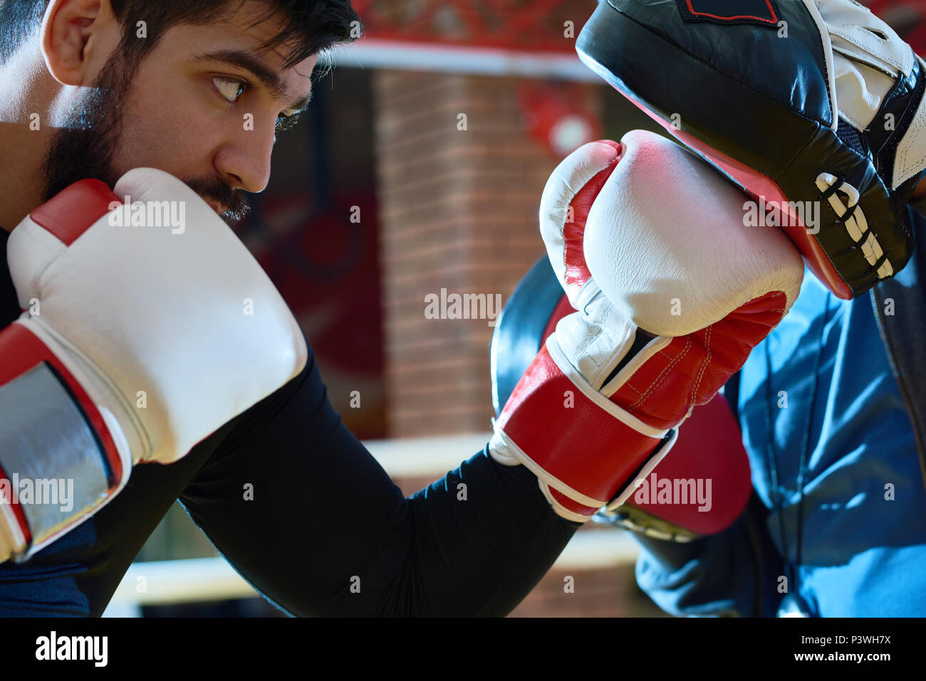 Boxer action punching hi-res stock photography and images - Alamy