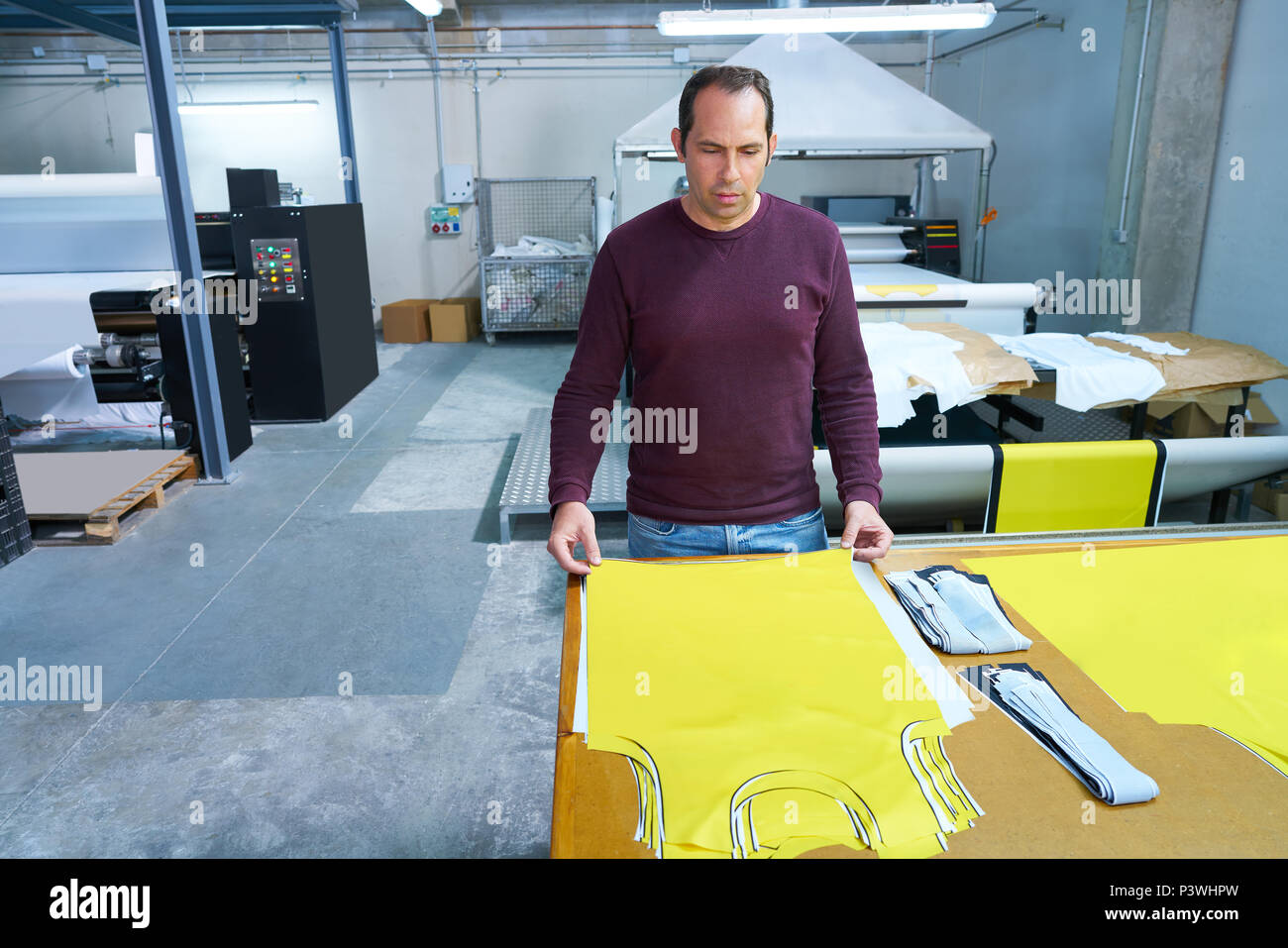 Production operator hi-res stock photography and images - Alamy