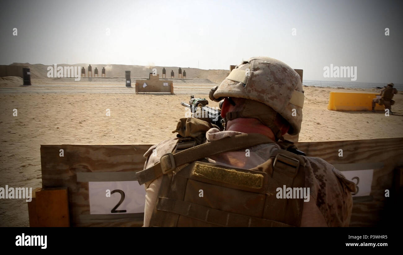 A Marine with Security Forces Company, Marine Wing Support Squadron-373 ...