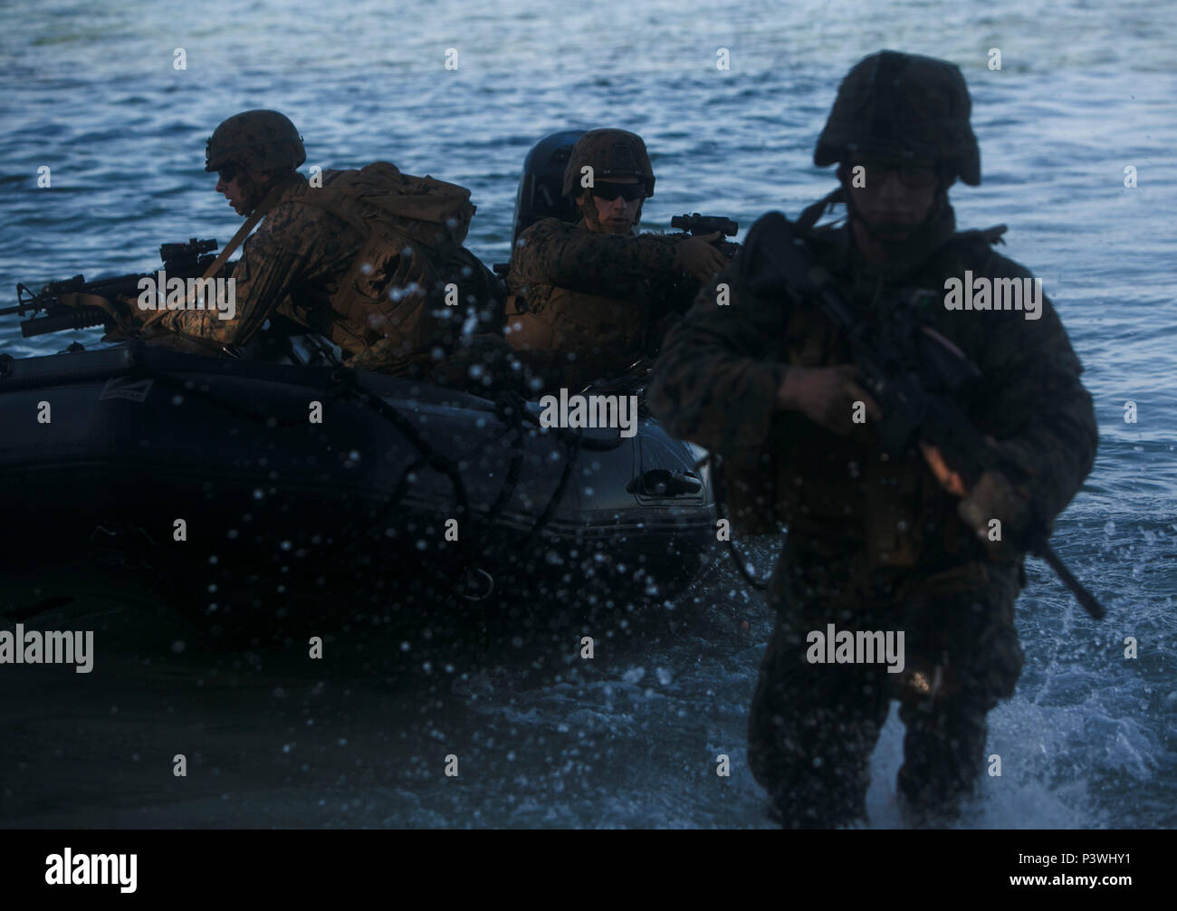 U.S. Marines conduct beach insertions via combat rubber raiding craft ...