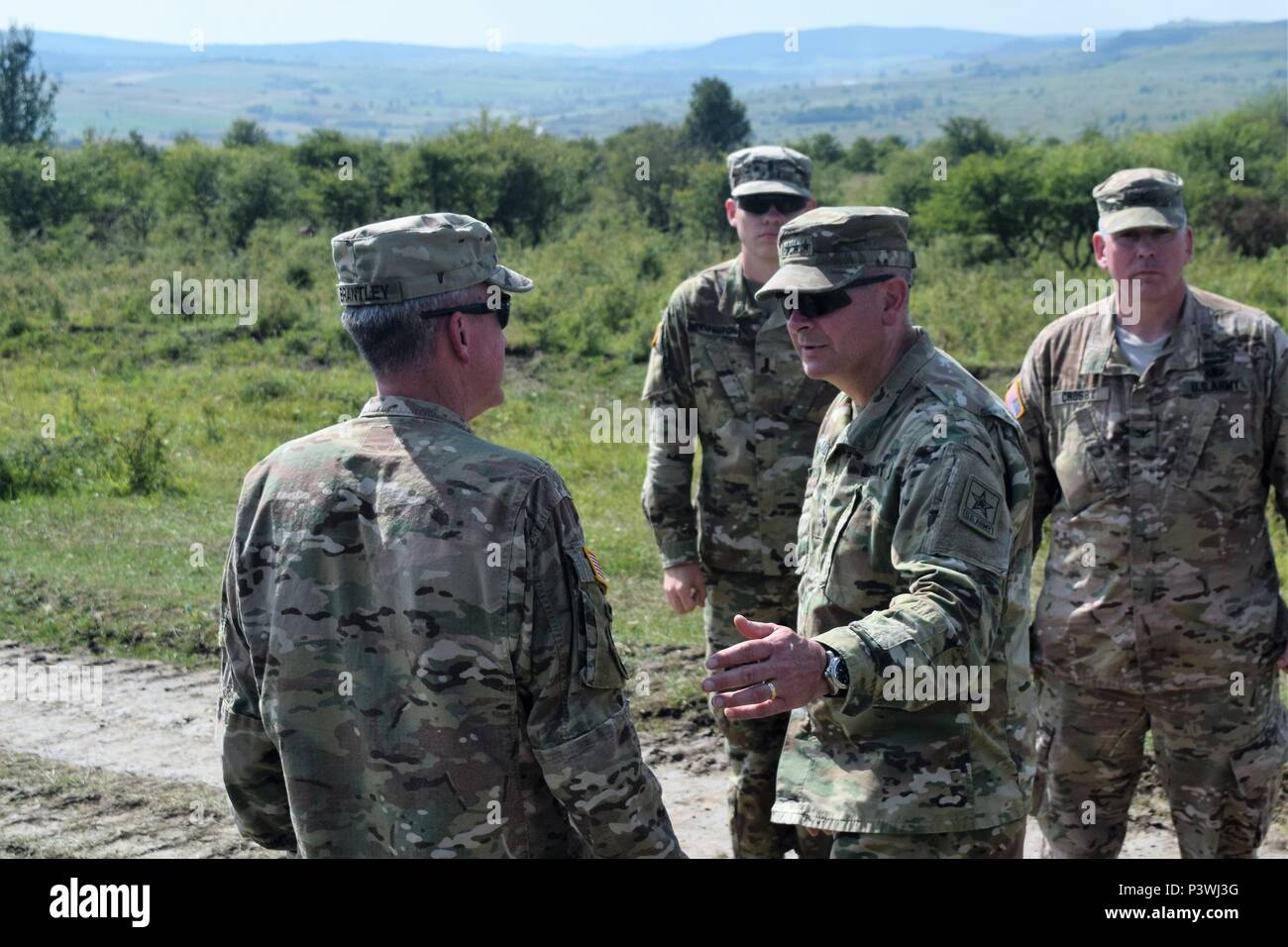 Lieutenant General Timothy Kadavy (center right), Director of the ...