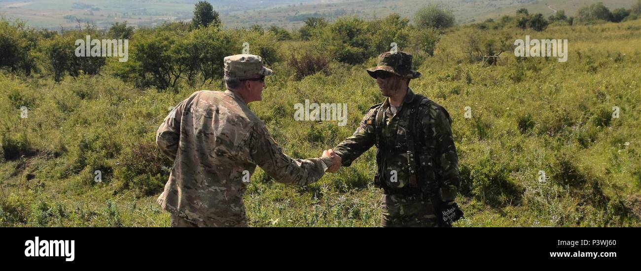 Col. Robey Brantley (Center), officer in charge of Operation Resolute ...
