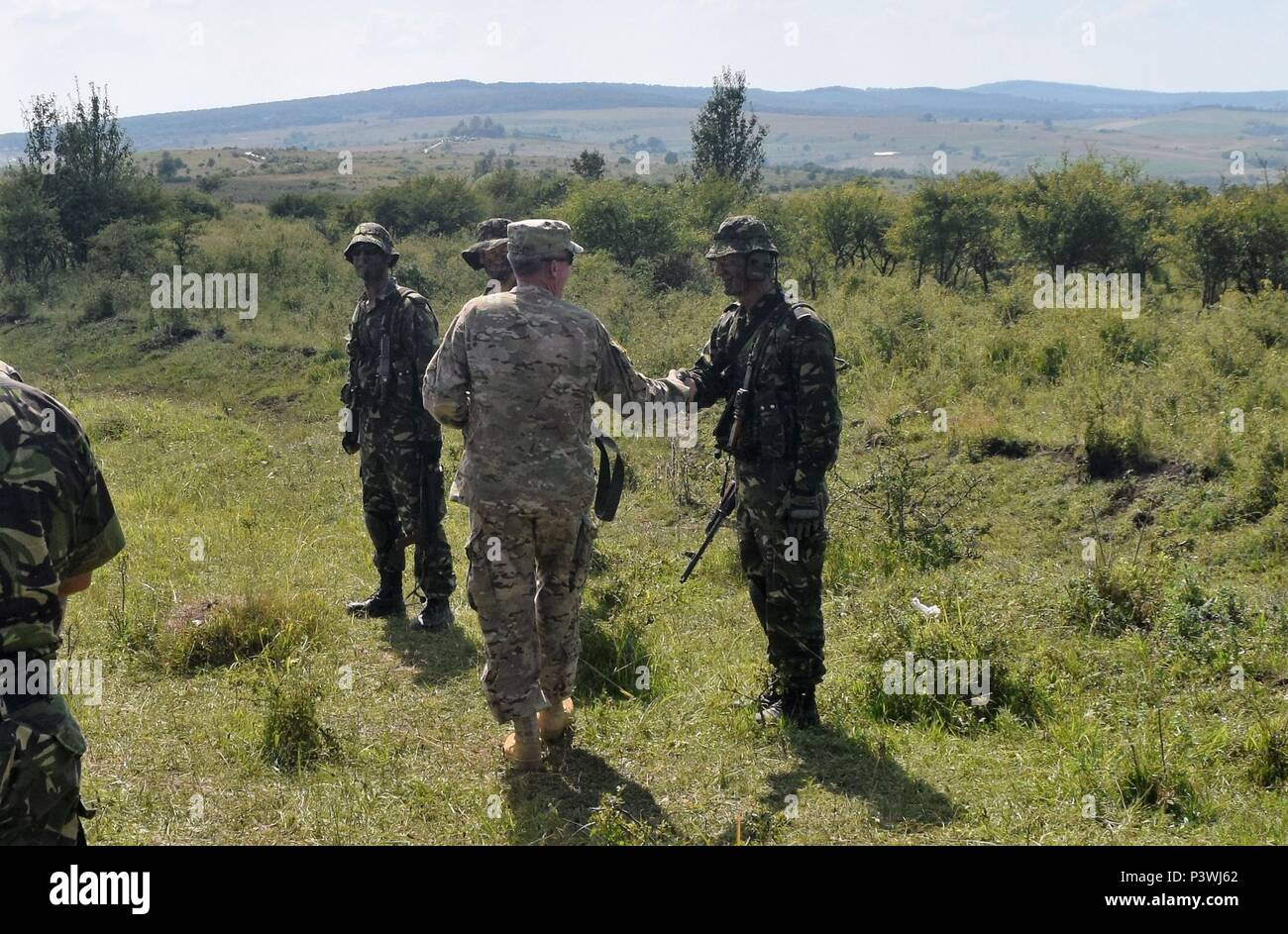 Col. Robey Brantley (Center), officer in charge of Operation Resolute ...