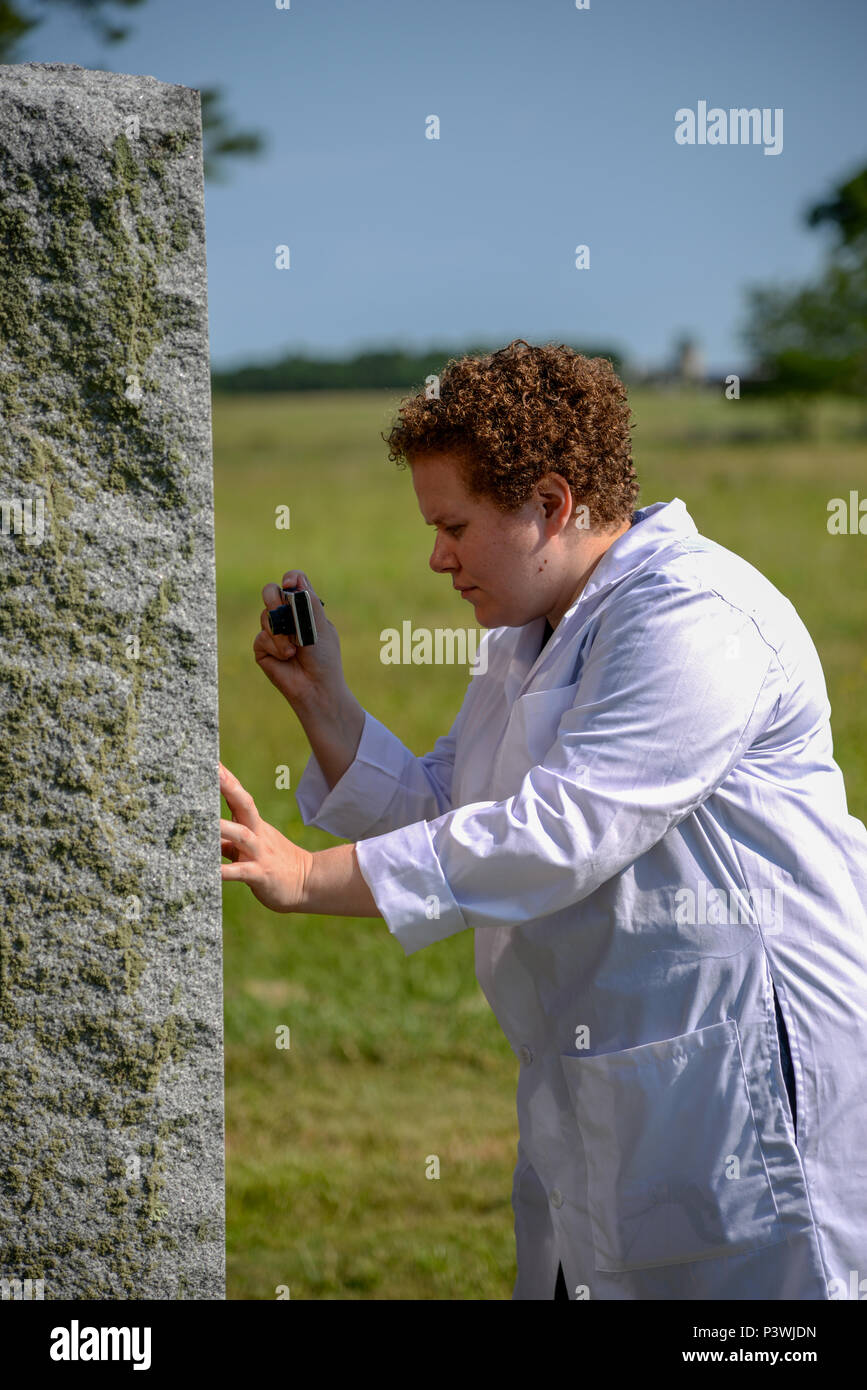 Melissa Swanson, Naval History and Heritage Command Conservator, takes ...