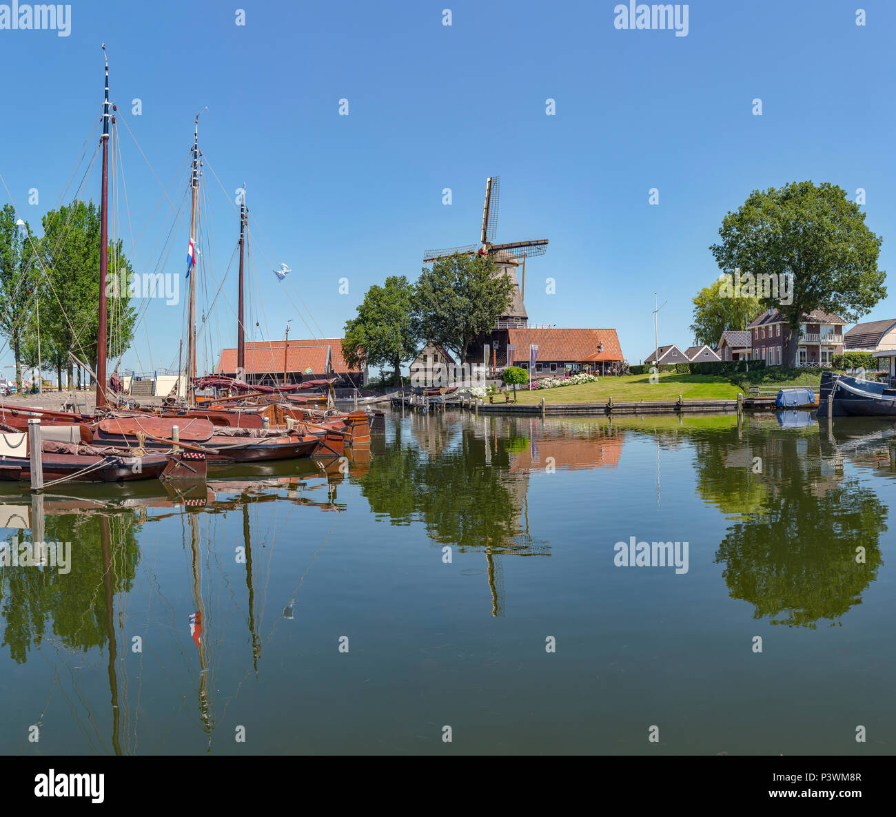 The fishing port with the towermill called De Hoop Stock Photo - Alamy