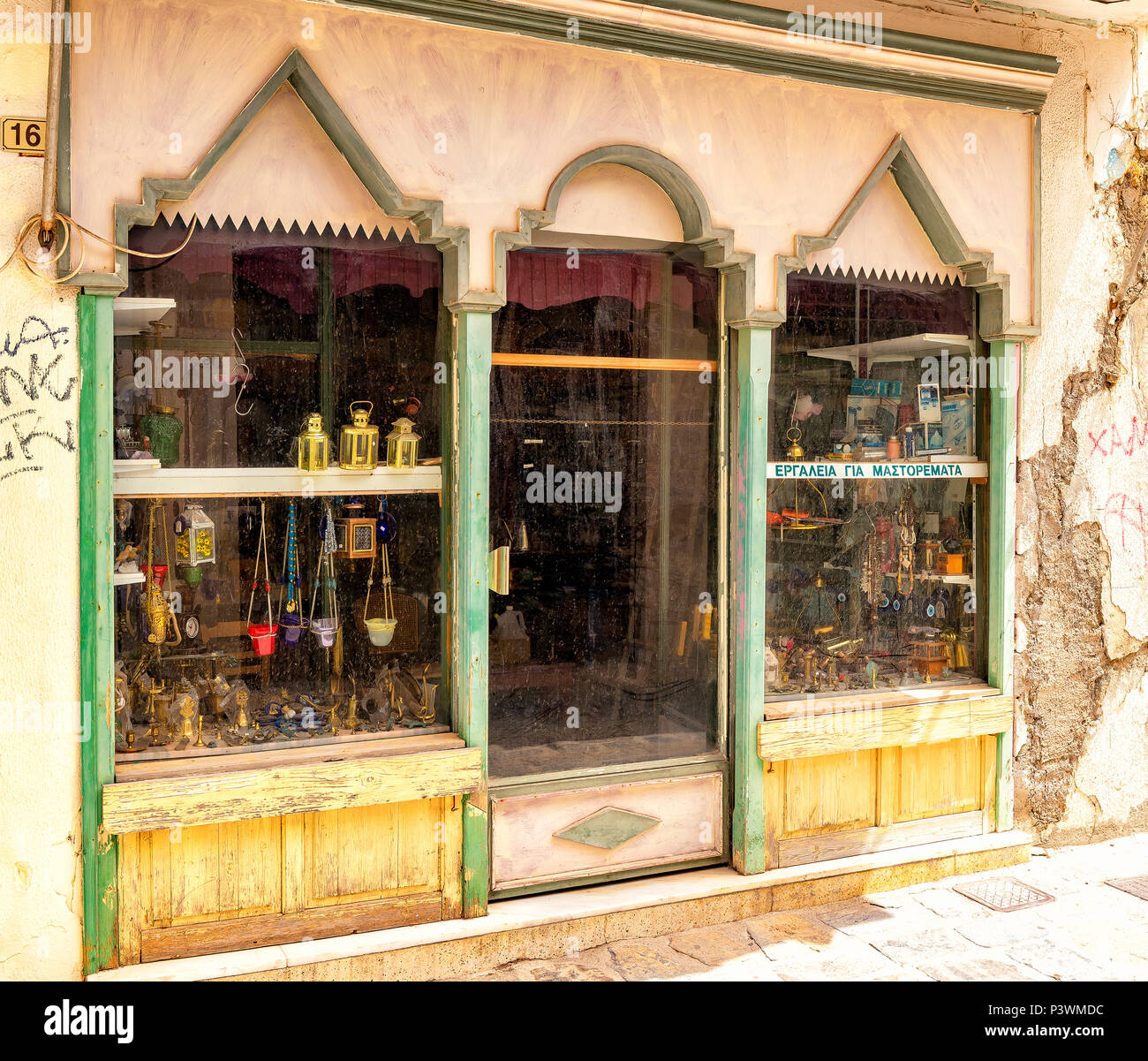 Old shop-window with copperware Stock Photo - Alamy