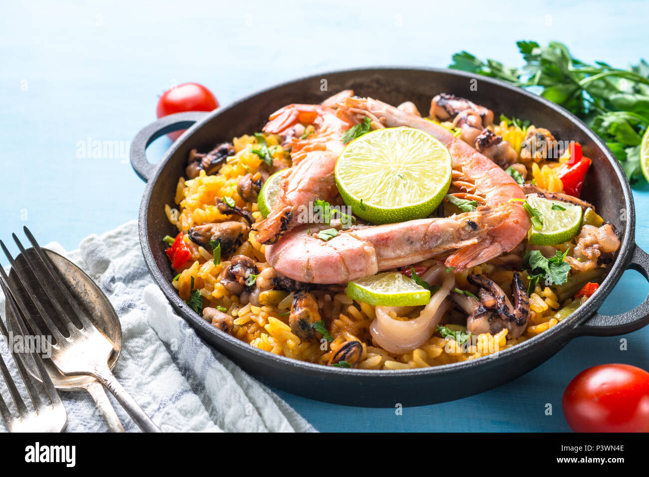 Seafood paella with shrimps, mussel and octopus. Traditional spanish ...