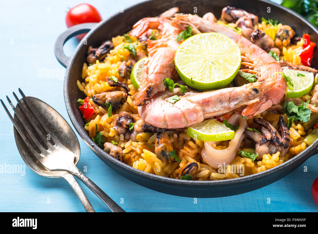 Seafood paella with shrimps, mussel and octopus. Traditional spanish ...