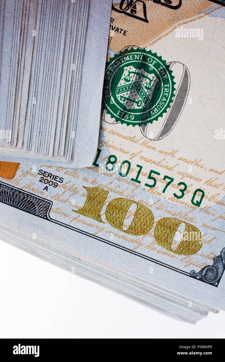 American 100 dollar banknotes made of paper placed on white background ...