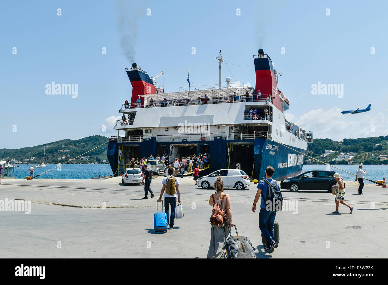 Boarding a ferry on Skiathos island Greece Stock Photo - Alamy