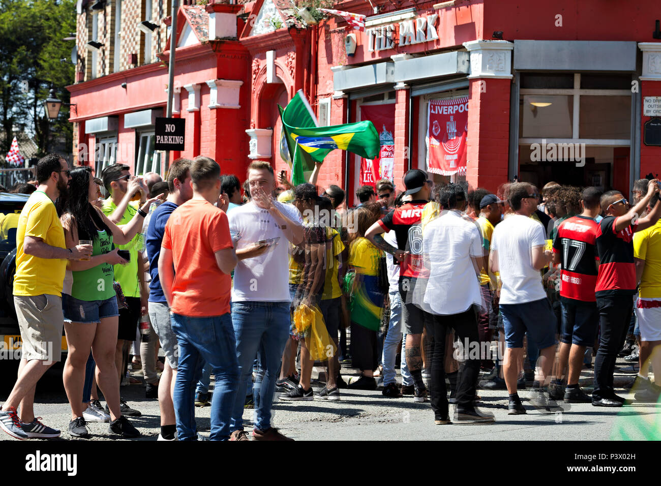 Multiple exposure image of football fans outside Anfield Liverpool for ...