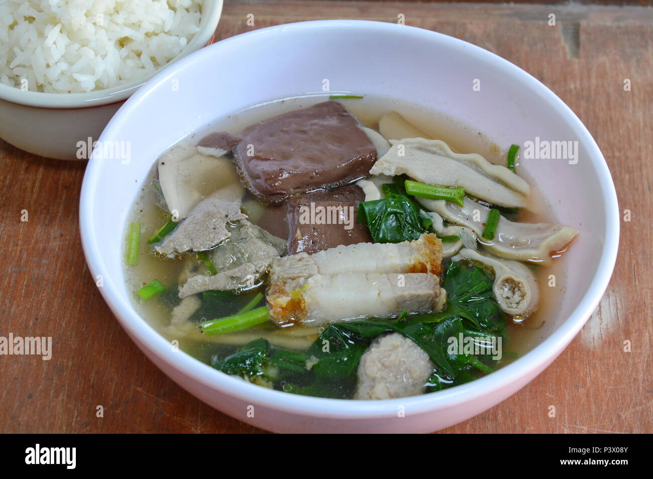 boiled pork blood and entrails in soup eat with rice Stock Photo - Alamy