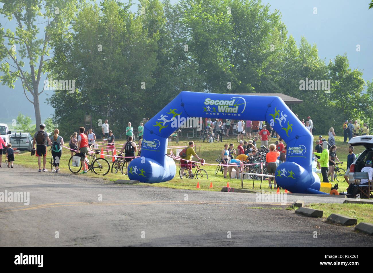 Attendees gather at the starting line of the triathlon Stock Photo - Alamy