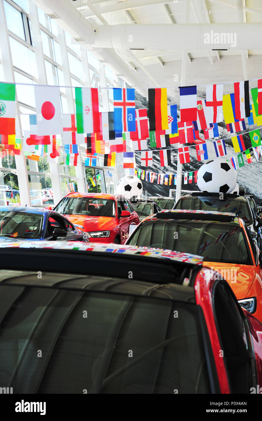 Car showroom showing Flags of different countries playing in 2018 World ...