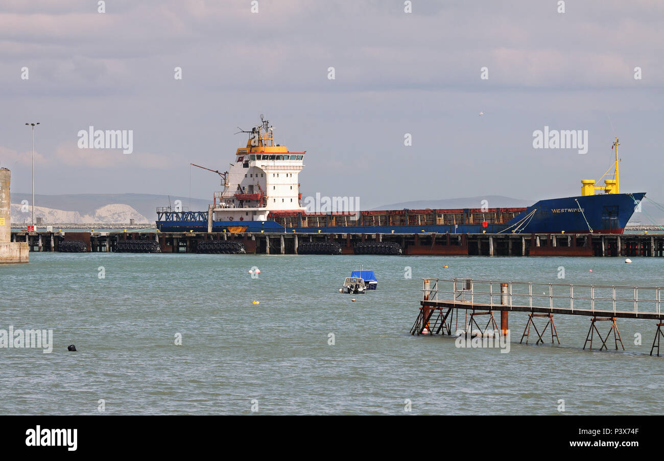 Portland Harbour in Dorset, England, with container Ship berthed ...