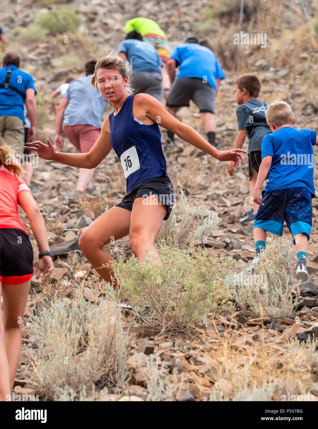 Athletes compete in a foot race and climb up "S" Mountain (Tenderfoot ...