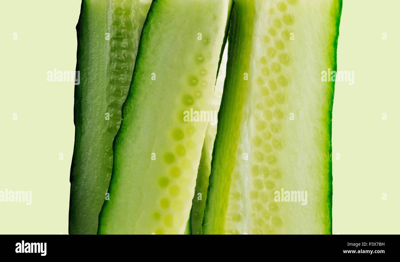 Diverse sections of cucumber on a colored background ,studio photo ...
