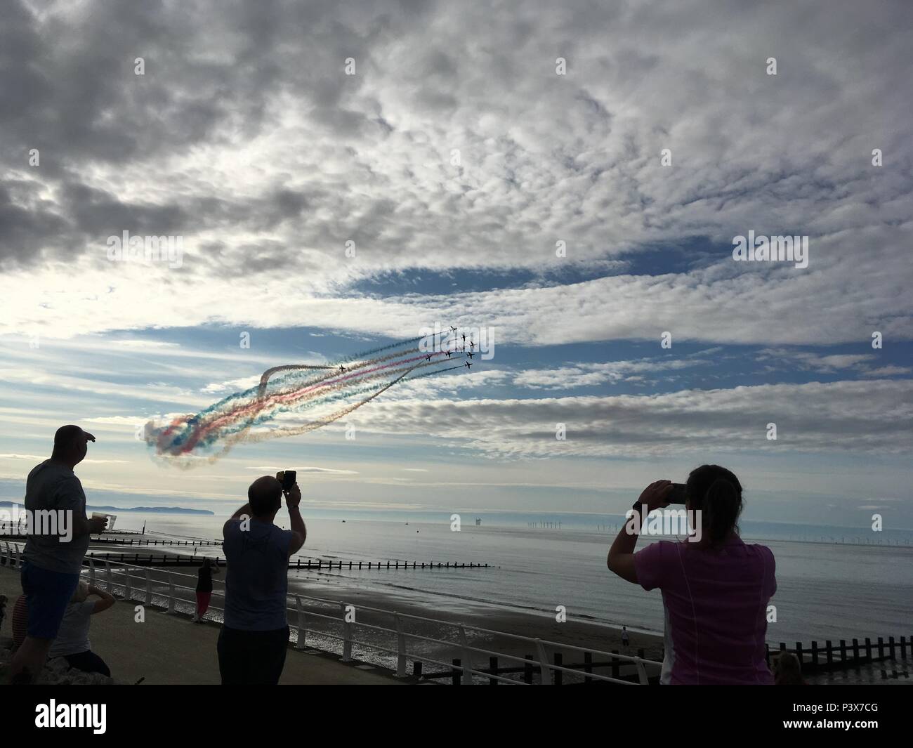 People enjoying watching the red arrows at the annual air show in Rhyl ...