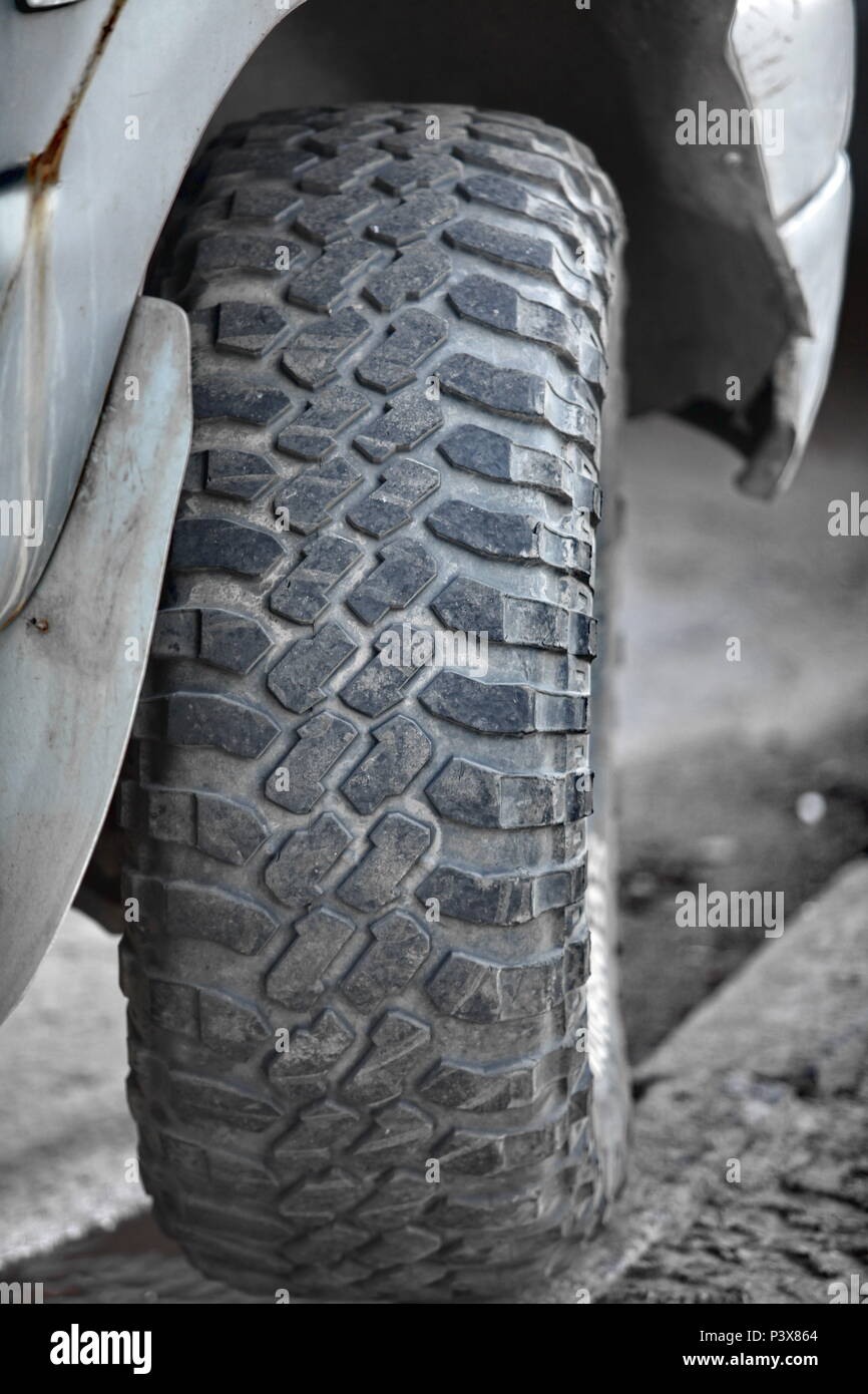 Front wheel off-road vehicle tread close up Stock Photo - Alamy