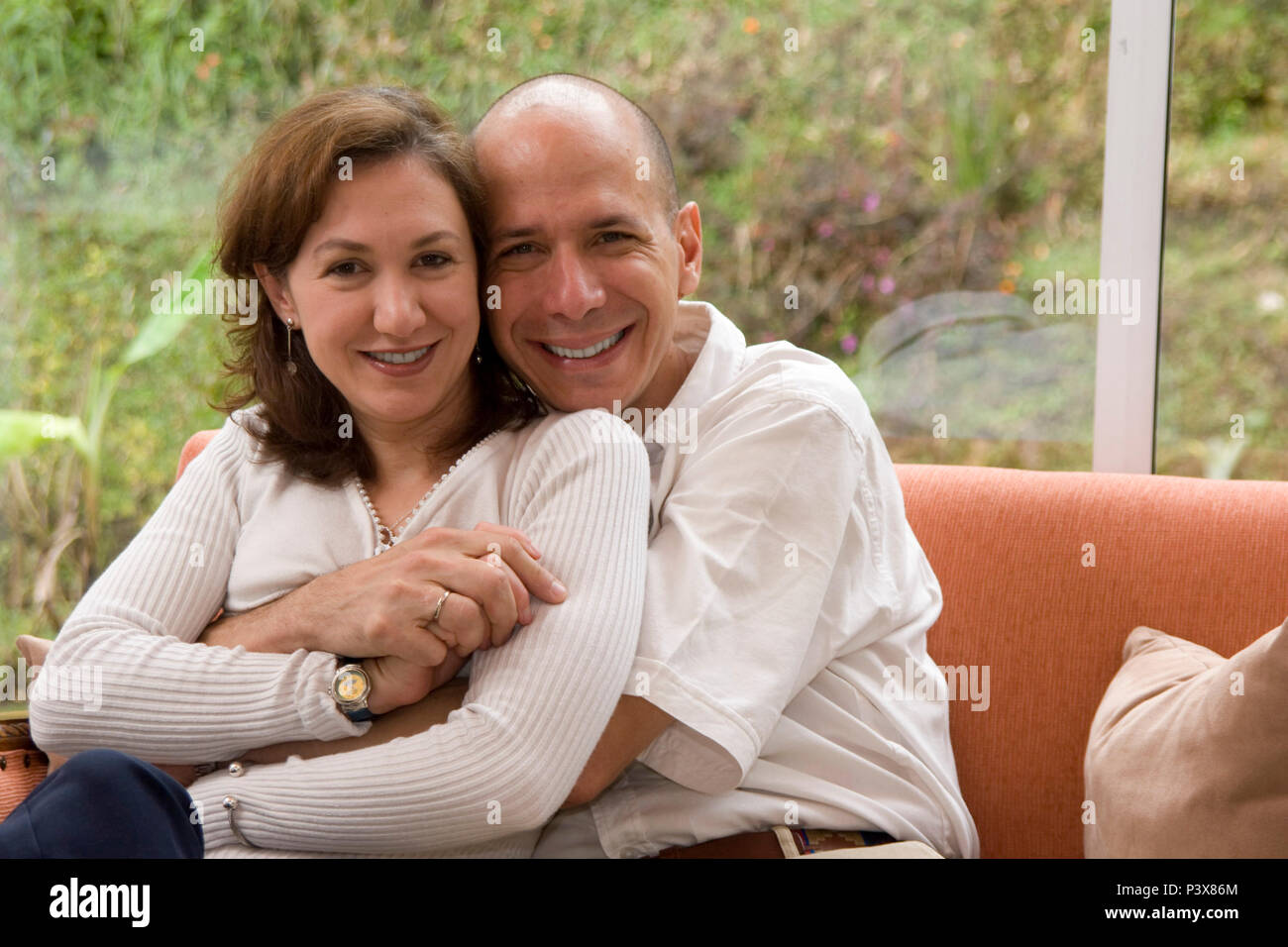 Loving couple having fun indoor Stock Photo - Alamy