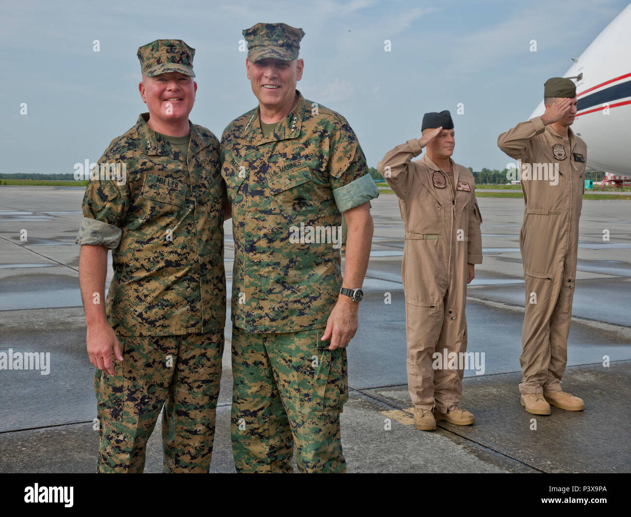 U.S. Marine Corps Gen. John M. Paxton Jr., middle, 33rd assistant ...