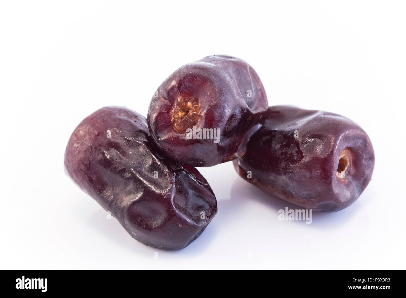 Three Ripe Dates Fruit Isolated on White Stock Photo - Alamy