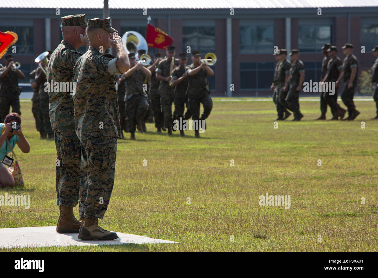U.S. Marine Corps Gen. John M. Paxton Jr., left, 33rd assistant ...