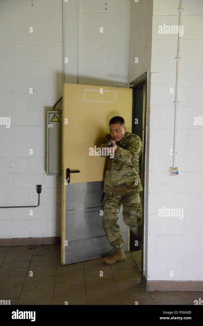 U.S. Army Sgt. 1st Class Michael Duque, assigned to U.S. Army Garrison ...