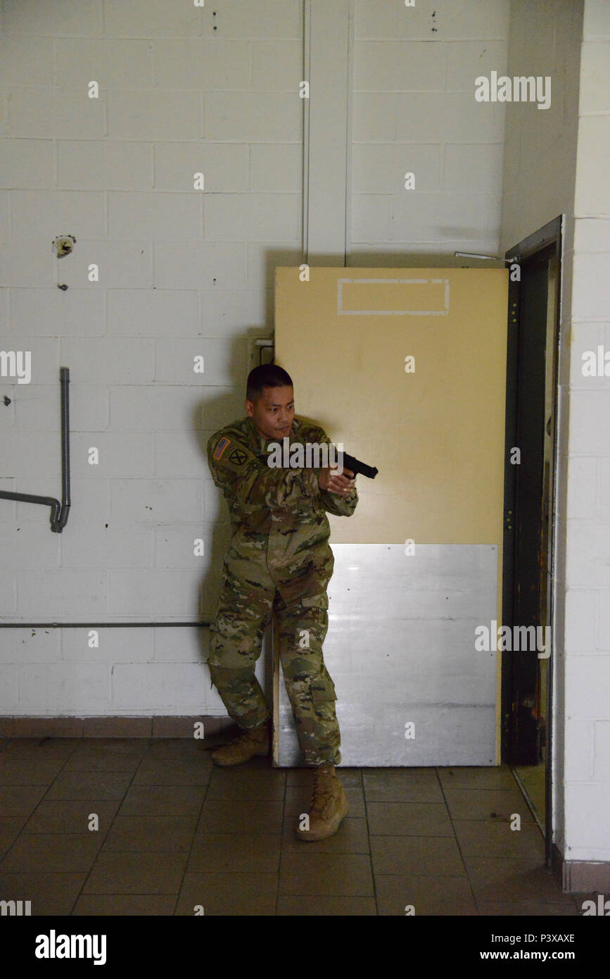 U.S. Army Sgt. 1st Class Michael Duque, assigned to U.S. Army Garrison ...
