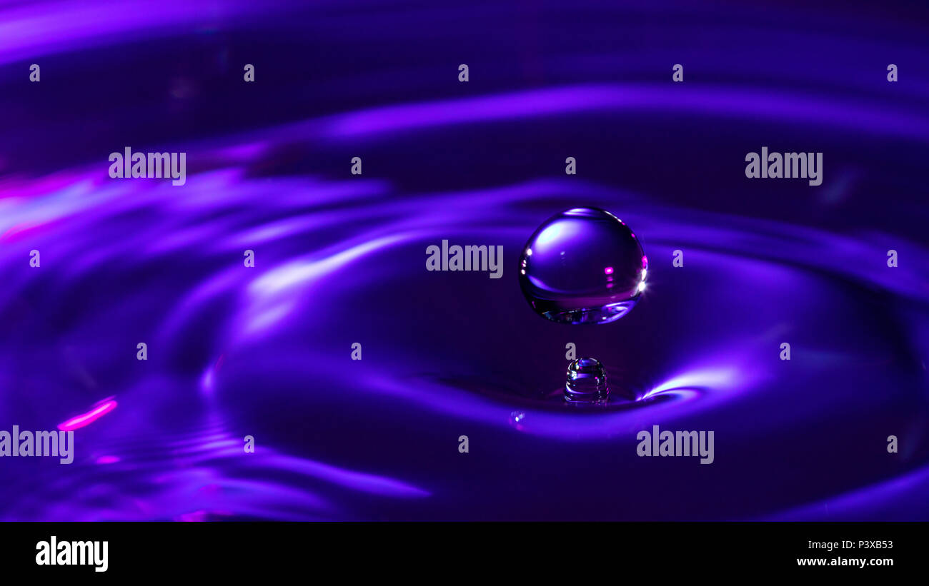 Purple ripples hi-res stock photography and images - Alamy