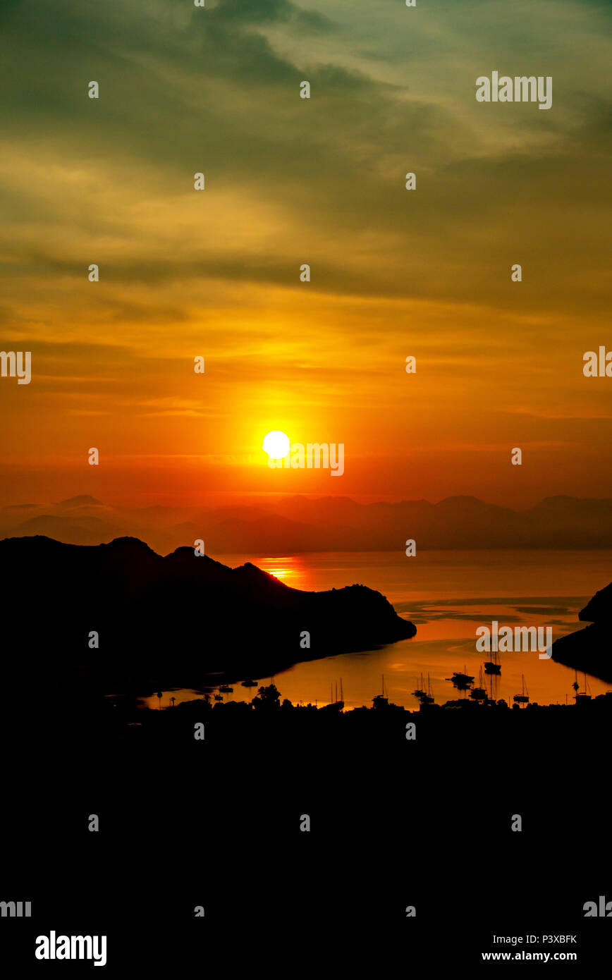 Mountain top view of Pedi Bay sunrise, Symi, Greece Stock Photo - Alamy
