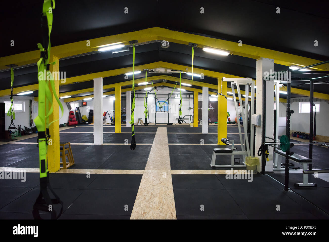 big empty interior of the Cross fitness gym Stock Photo - Alamy