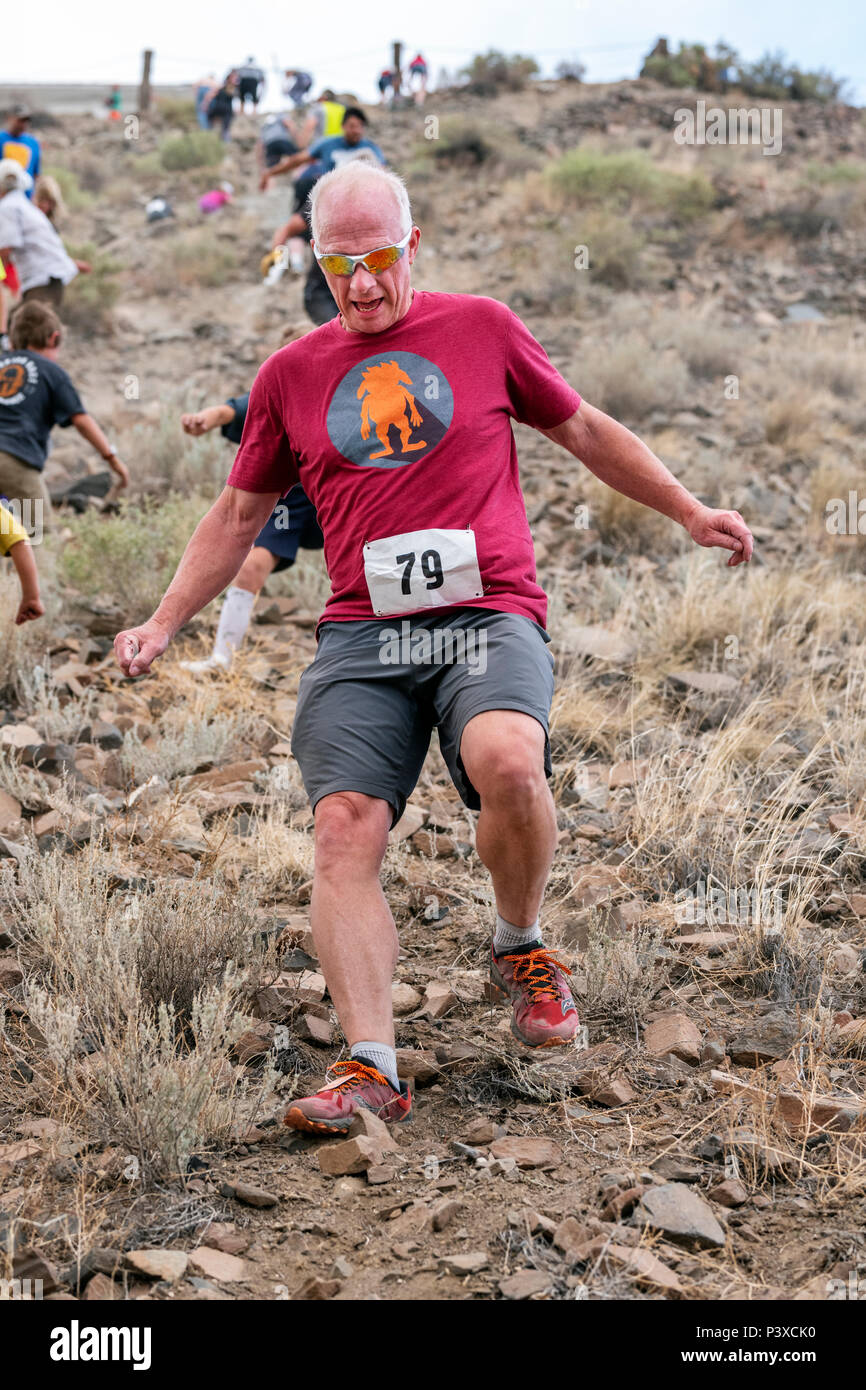 Athletes compete in a foot race and climb up "S" Mountain (Tenderfoot ...