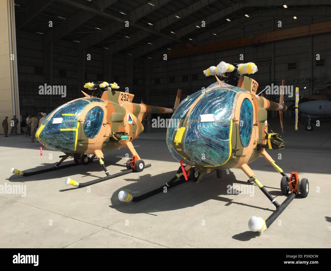 Two new MD-530 Cayuse Warrior helicopters, still with protective wrap ...