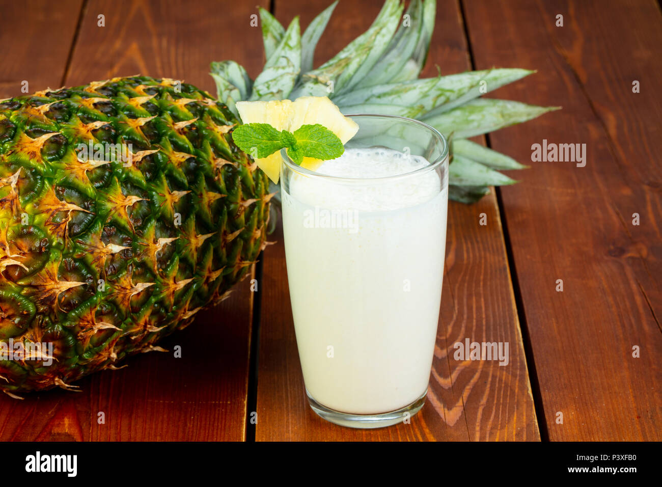 Sweet and cold pineapple shake Stock Photo - Alamy