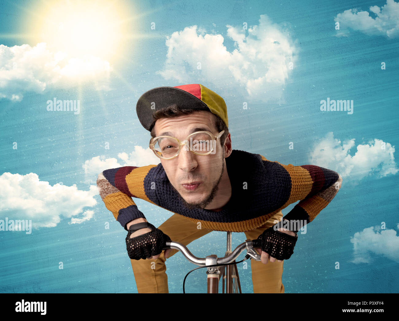 Nerd, crazy stylish rider on the bicycle with sunny weather Stock Photo ...