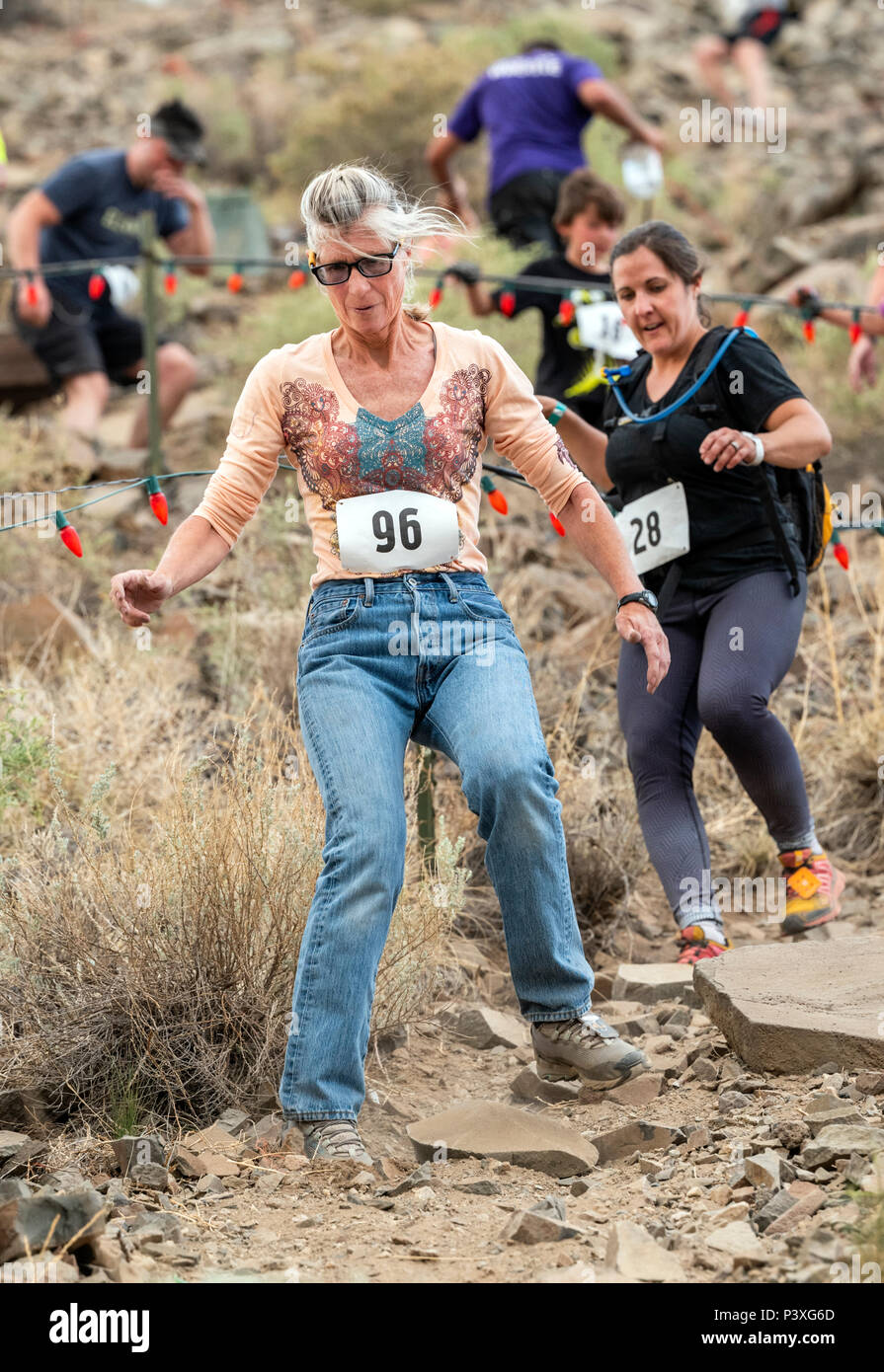 Female athlete Stacie Stallings competes in a foot race and climb up "S ...