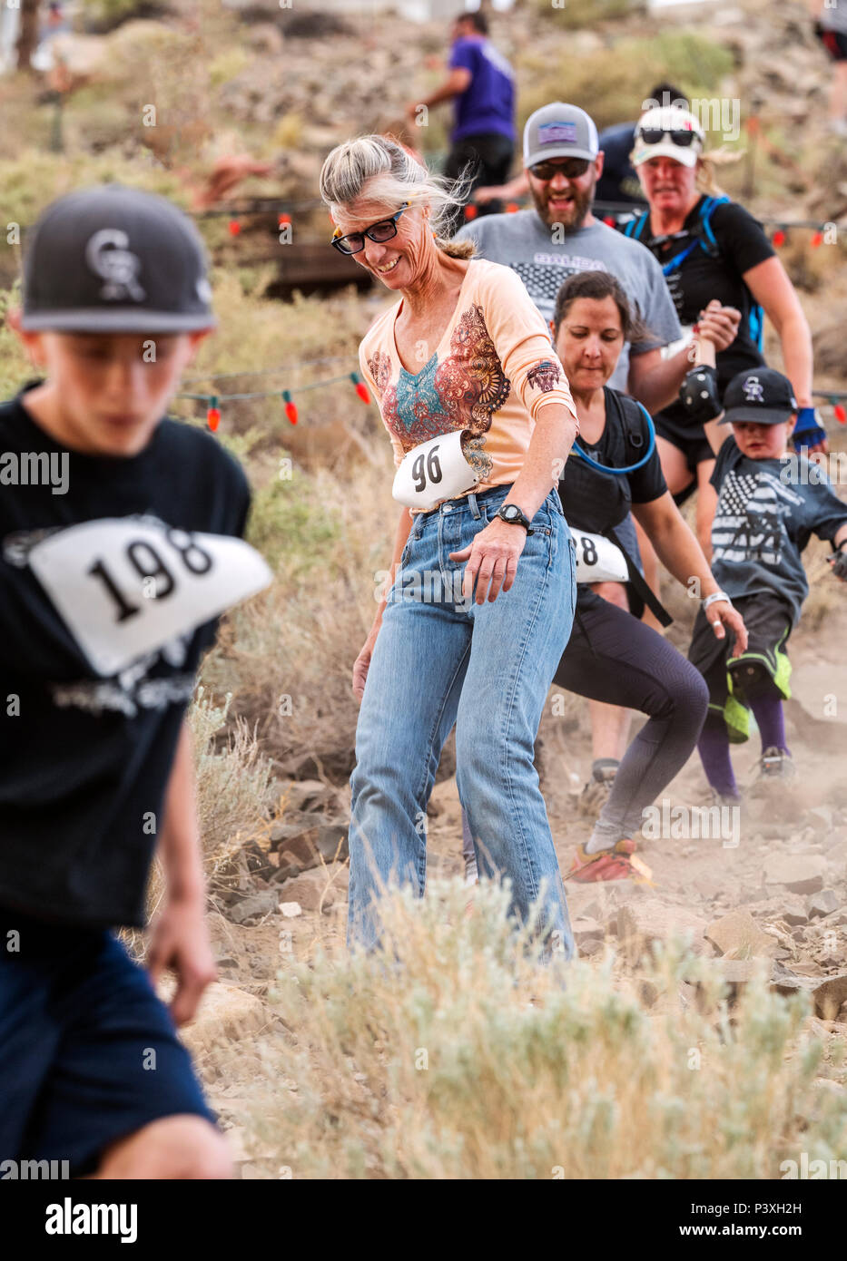 Female athlete Stacie Stallings competes in a foot race and climb up "S ...